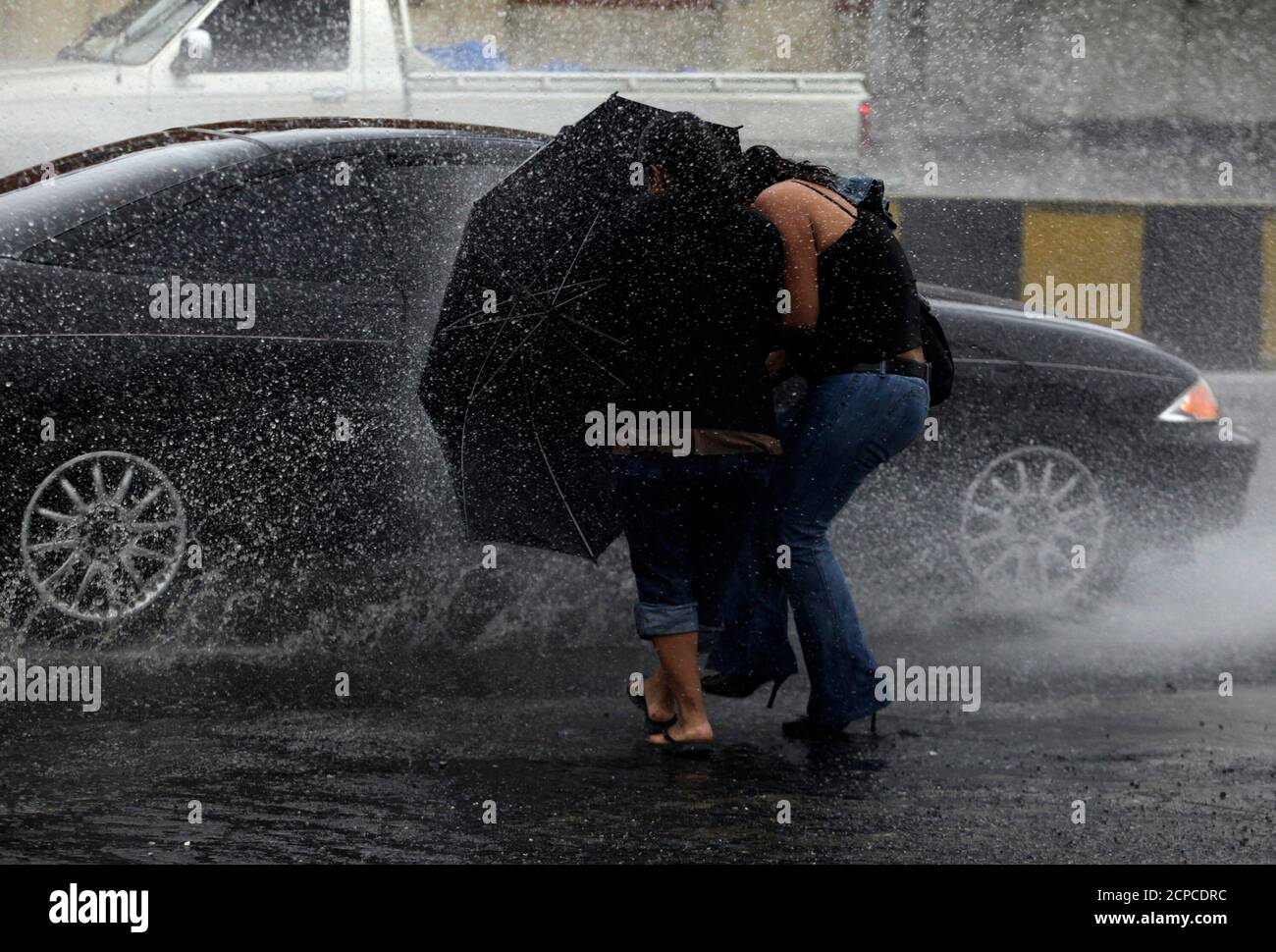 Car splash pedestrians hi-res stock photography and images - Alamy