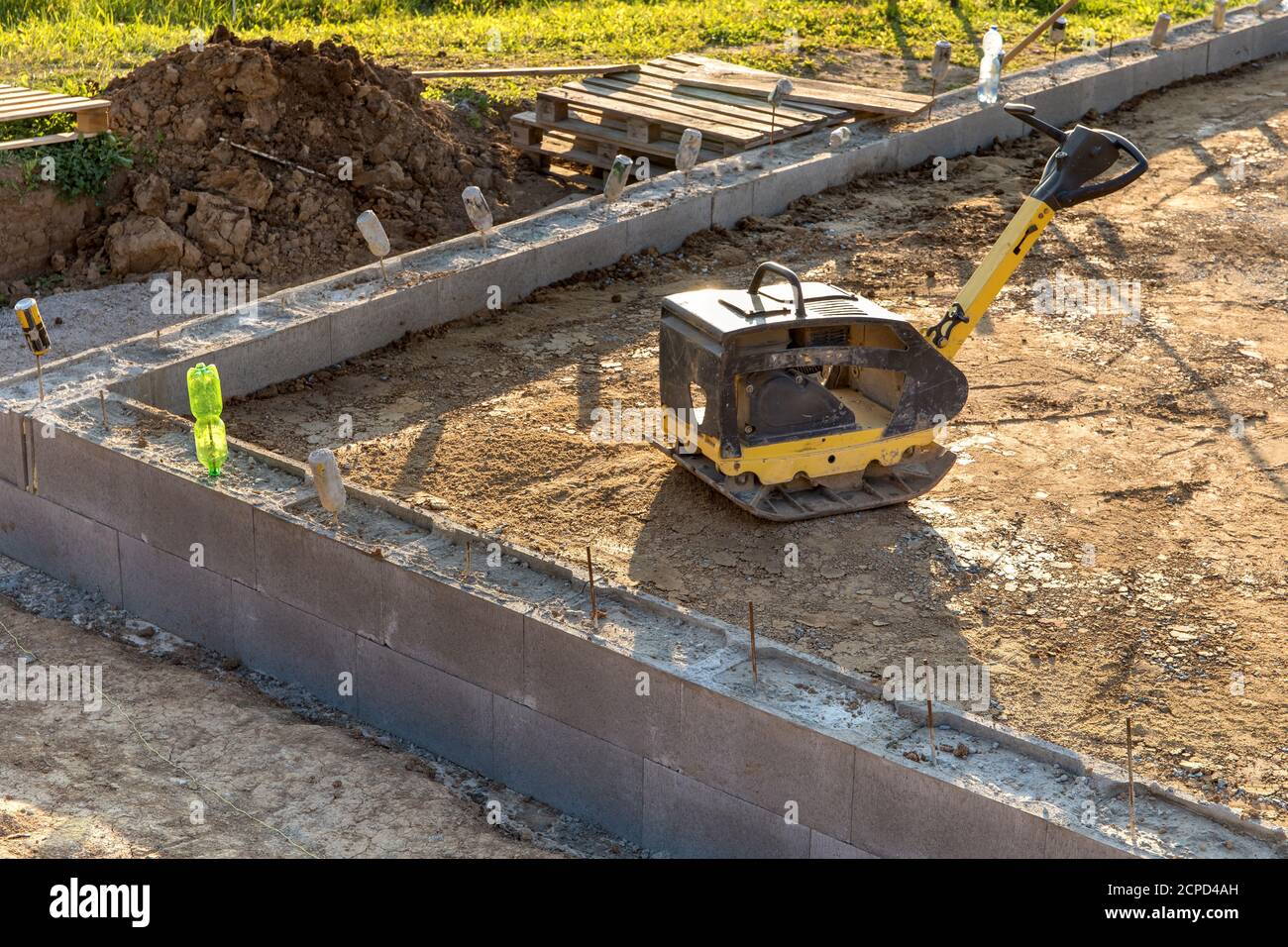 Vibratory plate compactor under construction. Vibratory plate compactor ...