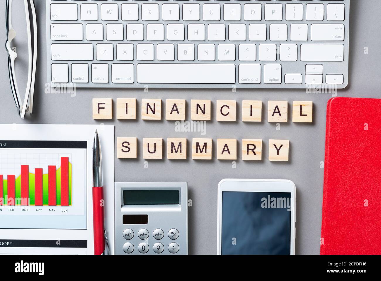 Financial summary concept with letters on cubes Stock Photo - Alamy