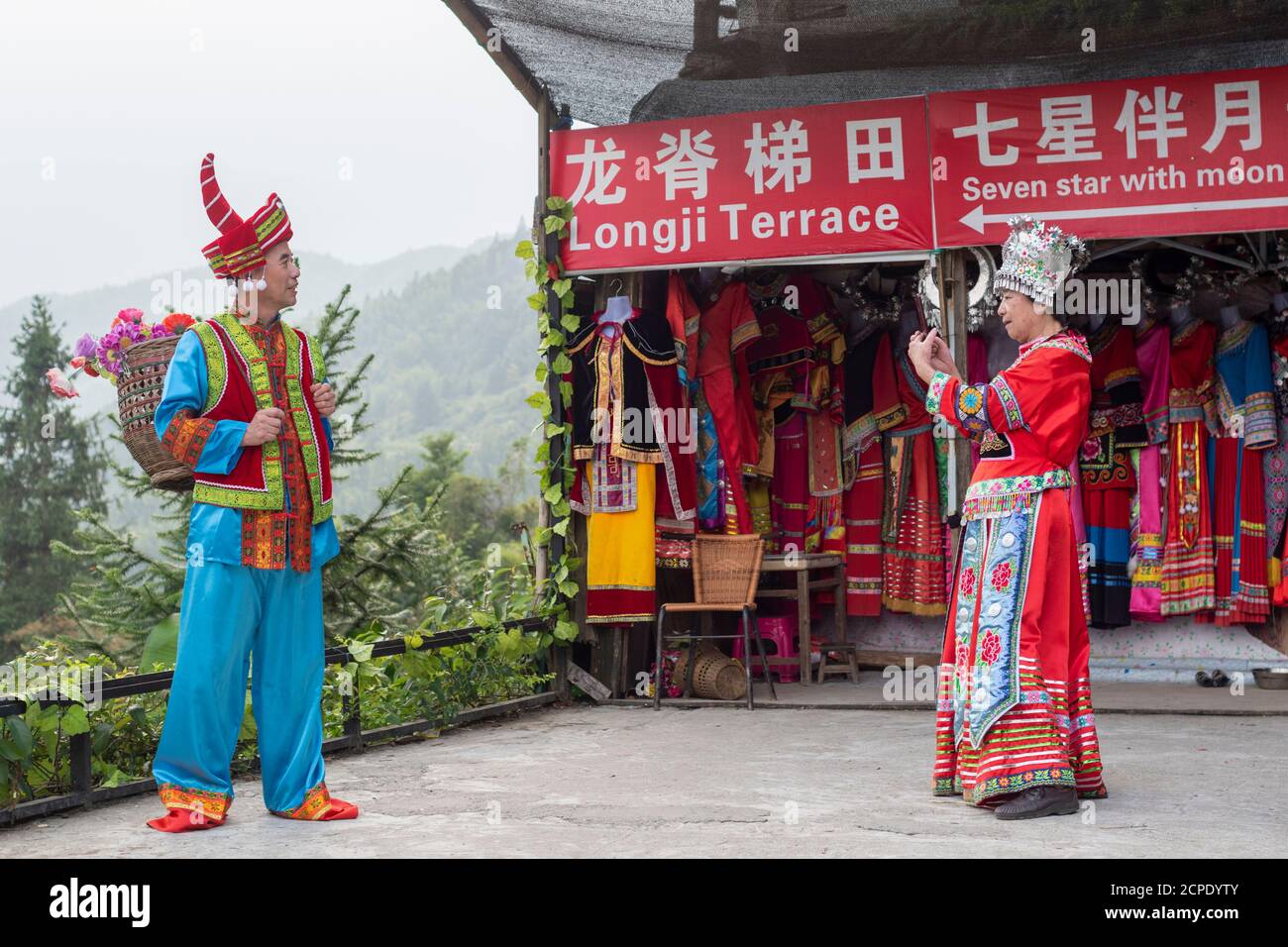Local tourists dress in traditional dress and take photos of each other ...
