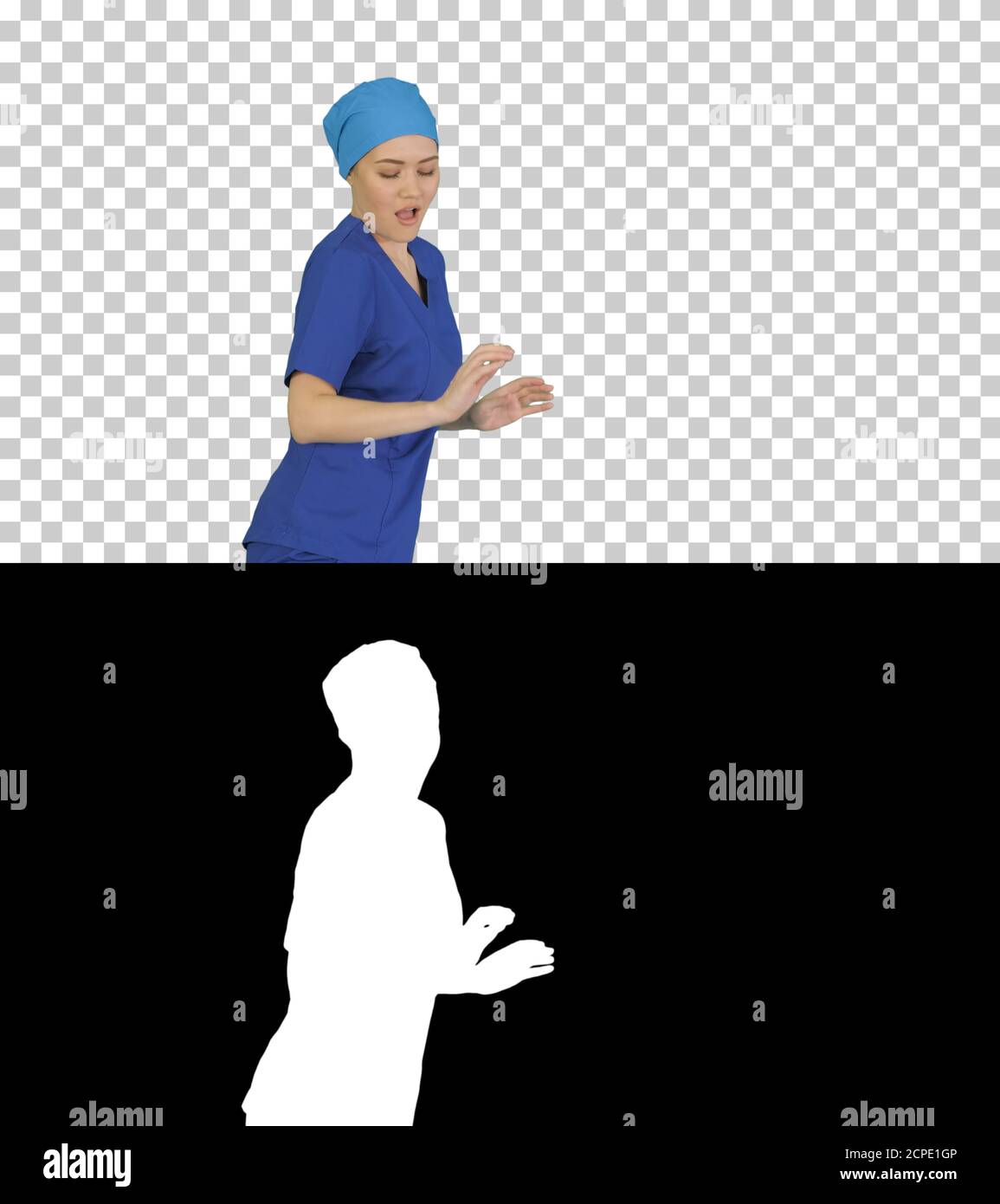 Smiling female medical doctor in blue uniform dancing and cheeri Stock ...