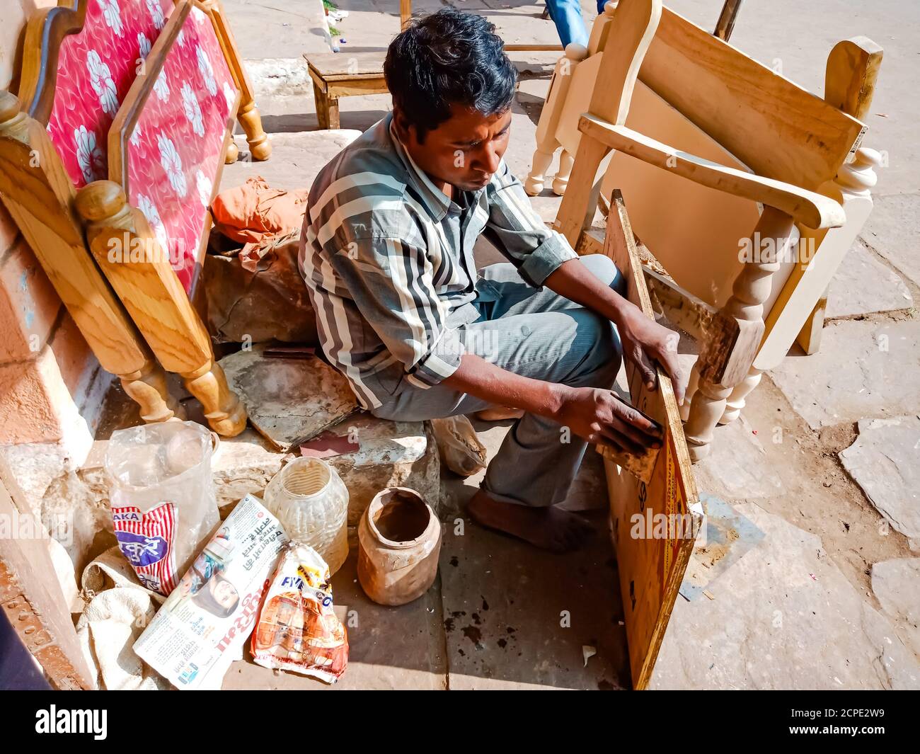 DISTRICT KATNI, INDIA - JANUARY 08, 2020: An indian woodworker working ...