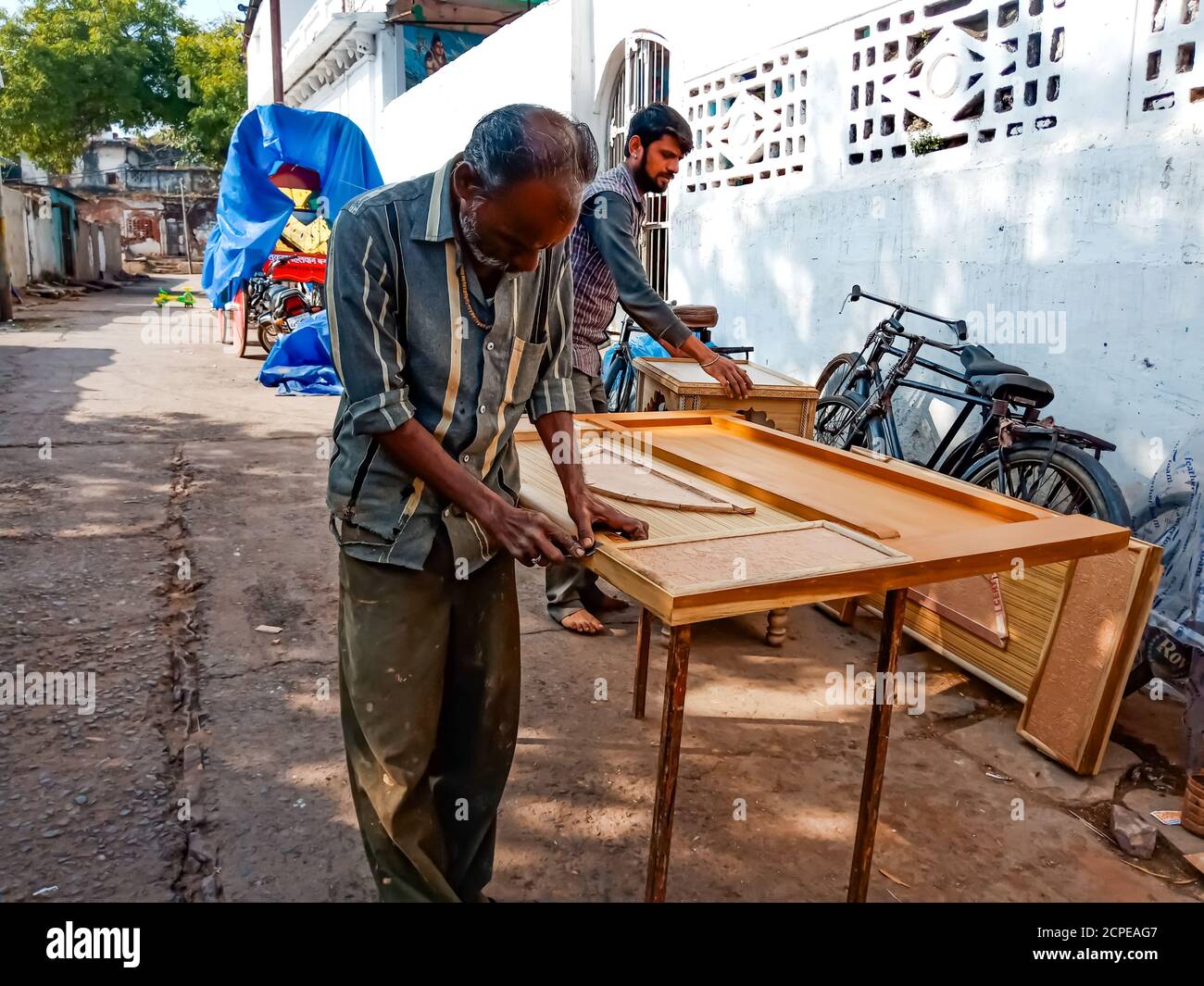 DISTRICT KATNI, INDIA - JANUARY 08, 2020: An indian old woodworker ...
