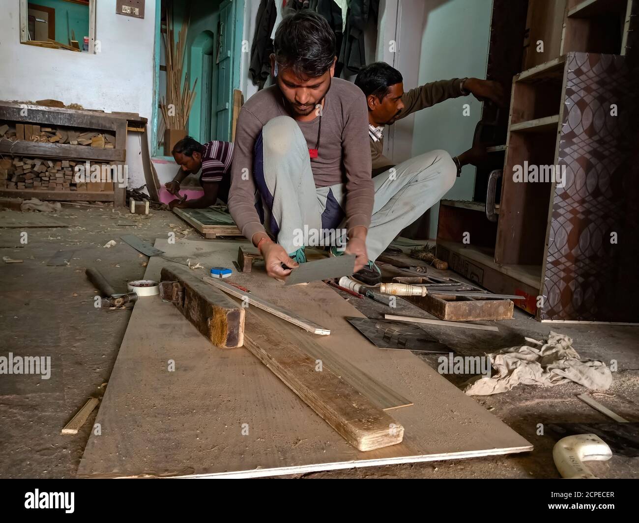 DISTRICT KATNI, INDIA - JANUARY 08, 2020: An indian woodworker boy ...