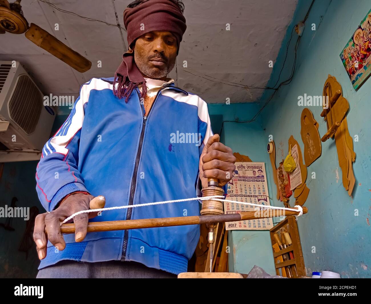 DISTRICT KATNI, INDIA - JANUARY 08, 2020: An indian saw factory worker ...