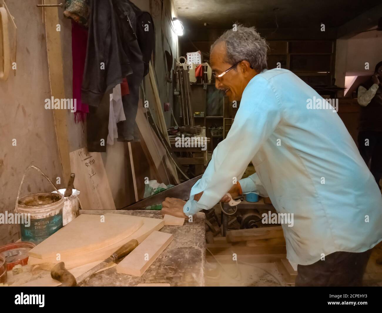 DISTRICT KATNI, INDIA - JANUARY 08, 2020: An indian saw factory worker ...