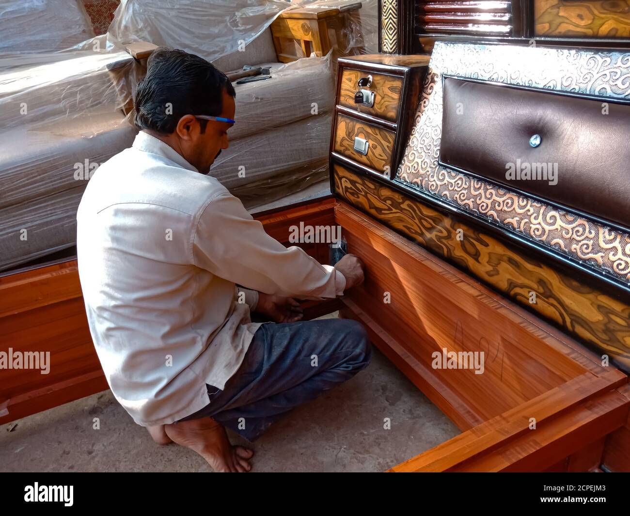 DISTRICT KATNI, INDIA - JANUARY 08, 2020: An indian saw factory worker ...