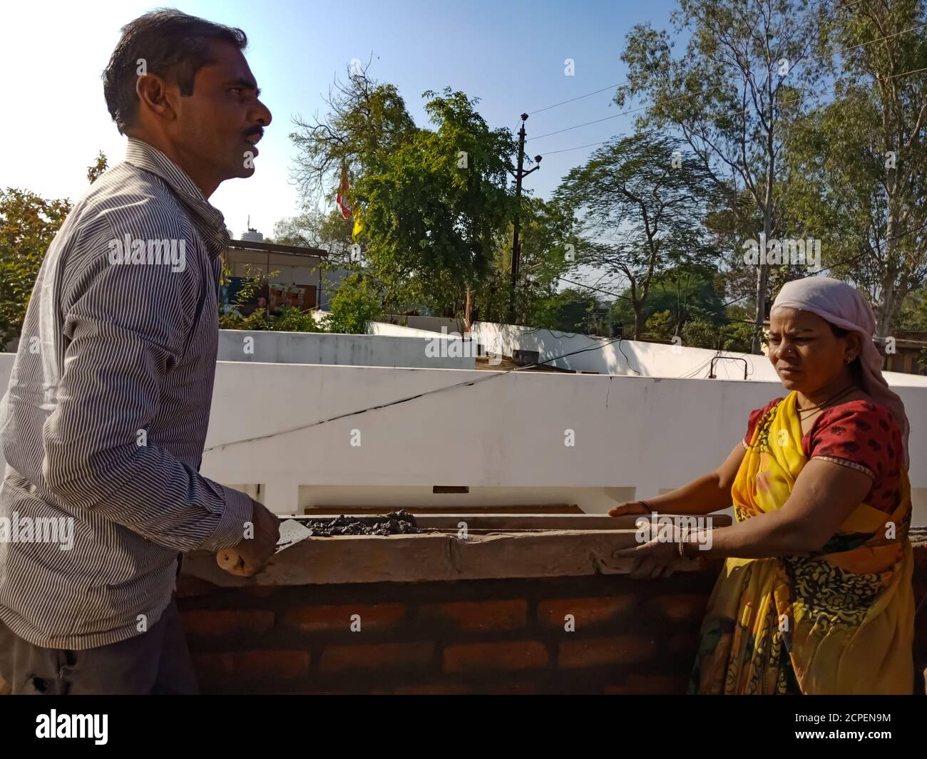 DISTRICT KATNI, INDIA - JANUARY 13, 2020: Two indian village labours ...