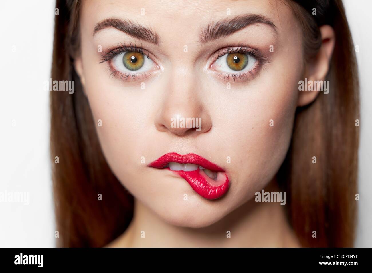 Close up woman bites hi-res stock photography and images - Alamy