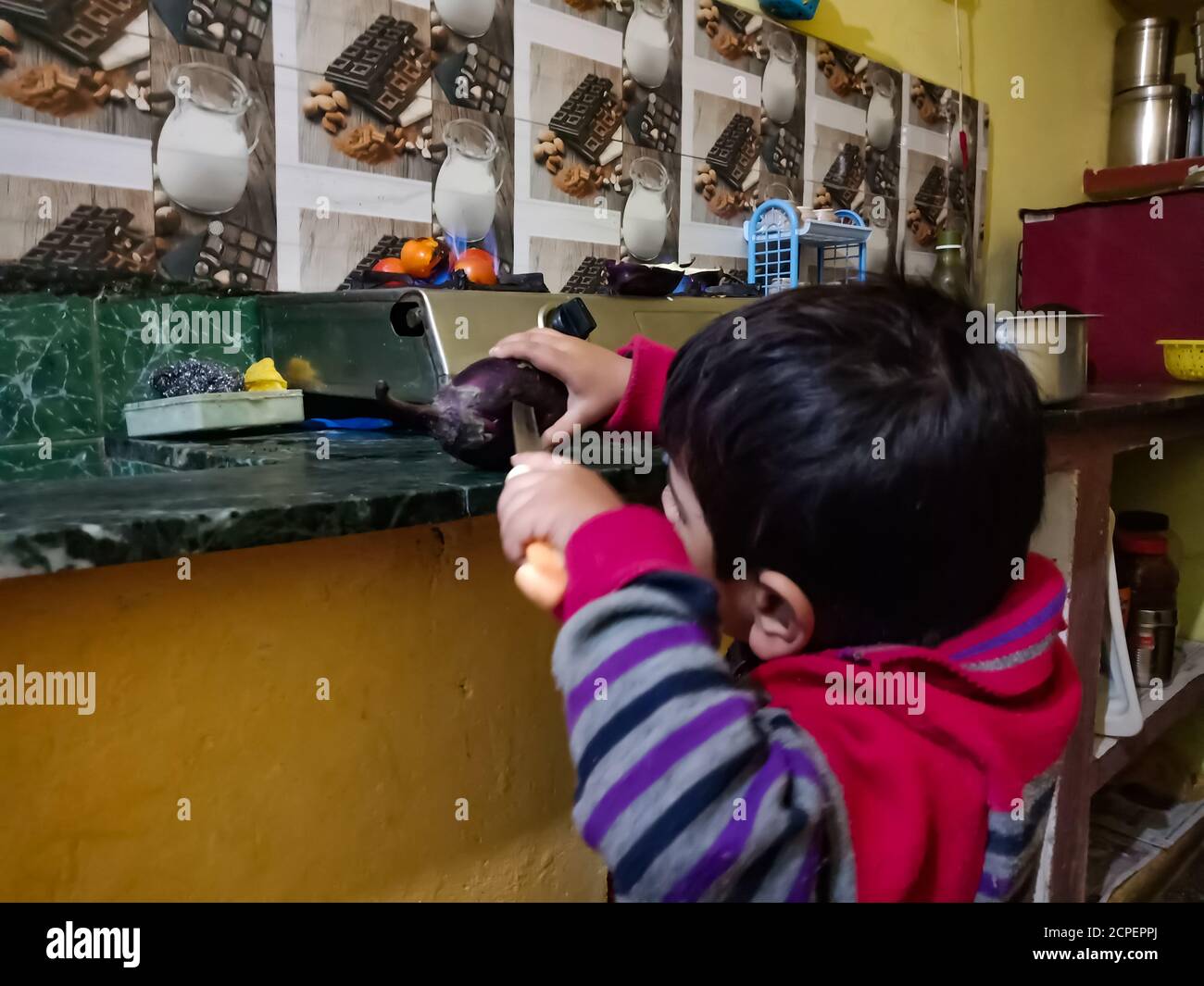 DISTRICT KATNI, INDIA - JANUARY 15, 2020: Indian little cute boy holded ...