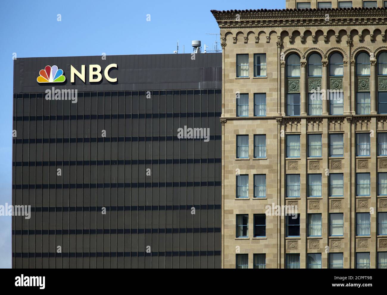 The NBC logo is picture atop their office building in San Diego ...