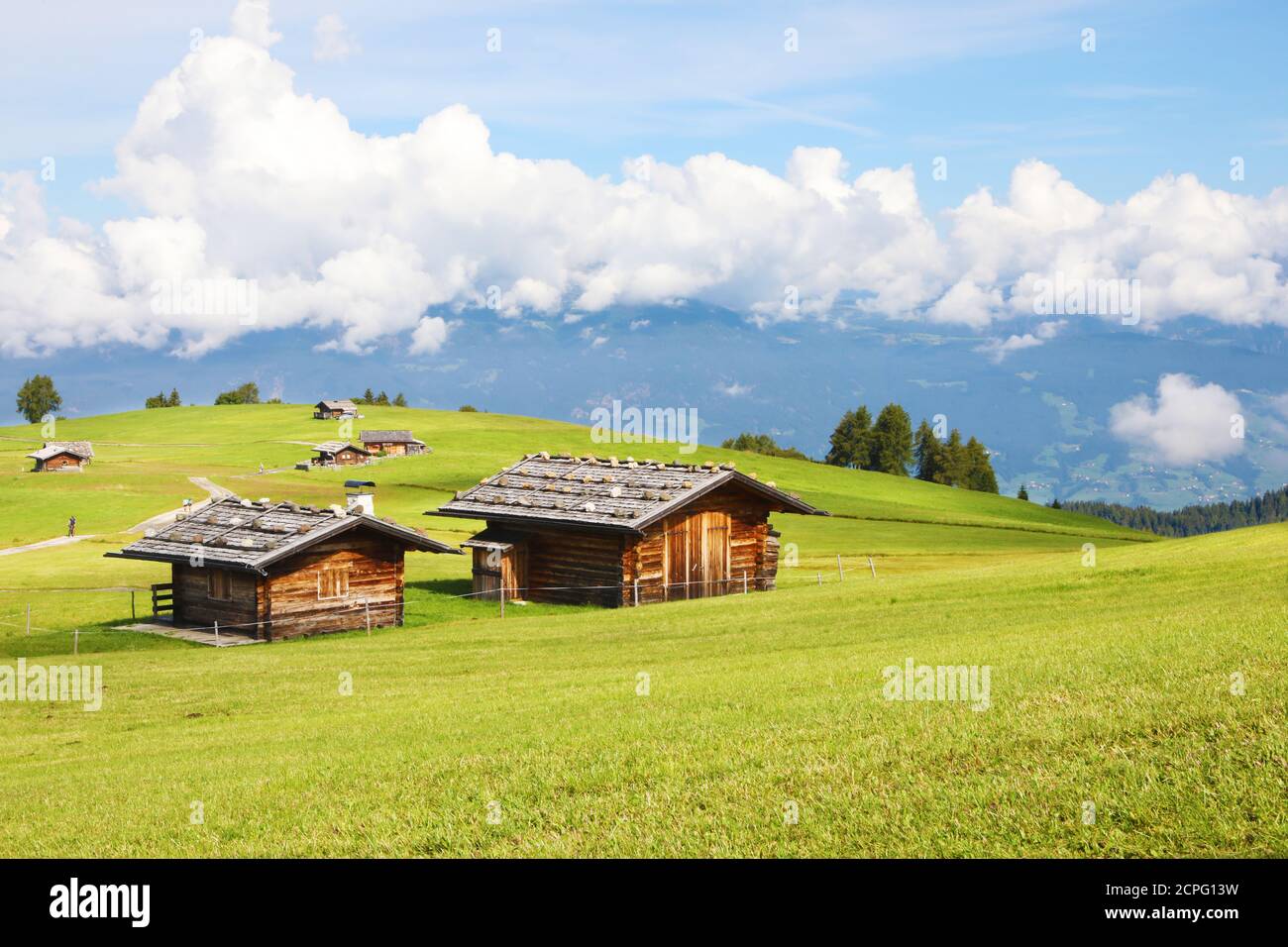 Mountain huts in Seiser Alm, plateau of italian Alps Stock Photo - Alamy