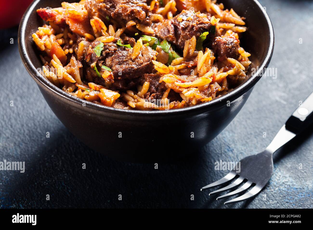 Giouvetsi - Greek beef and orzo stew. Balkanian cuisine Stock Photo - Alamy