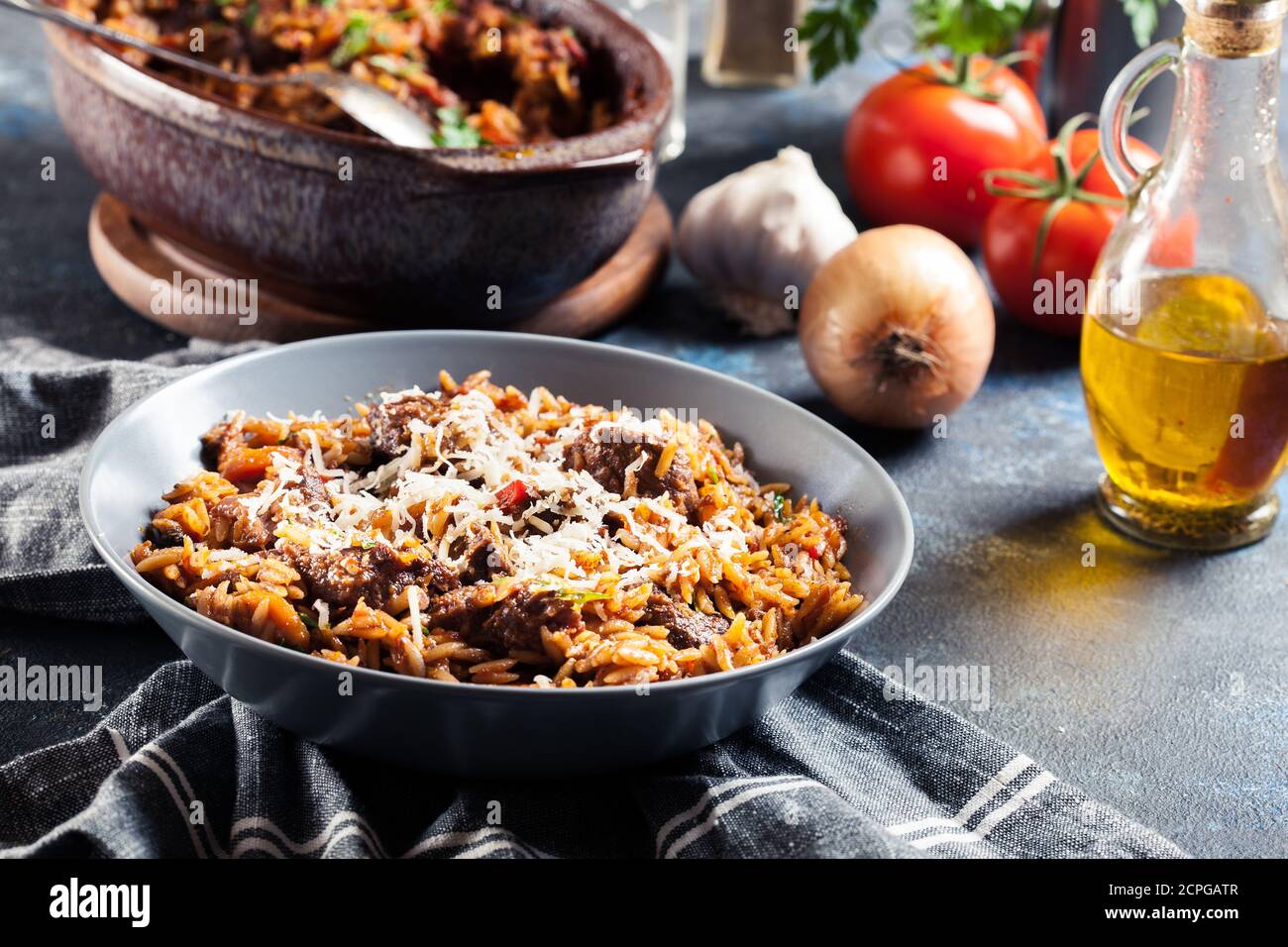 Giouvetsi - Greek beef and orzo stew. Balkanian cuisine Stock Photo - Alamy