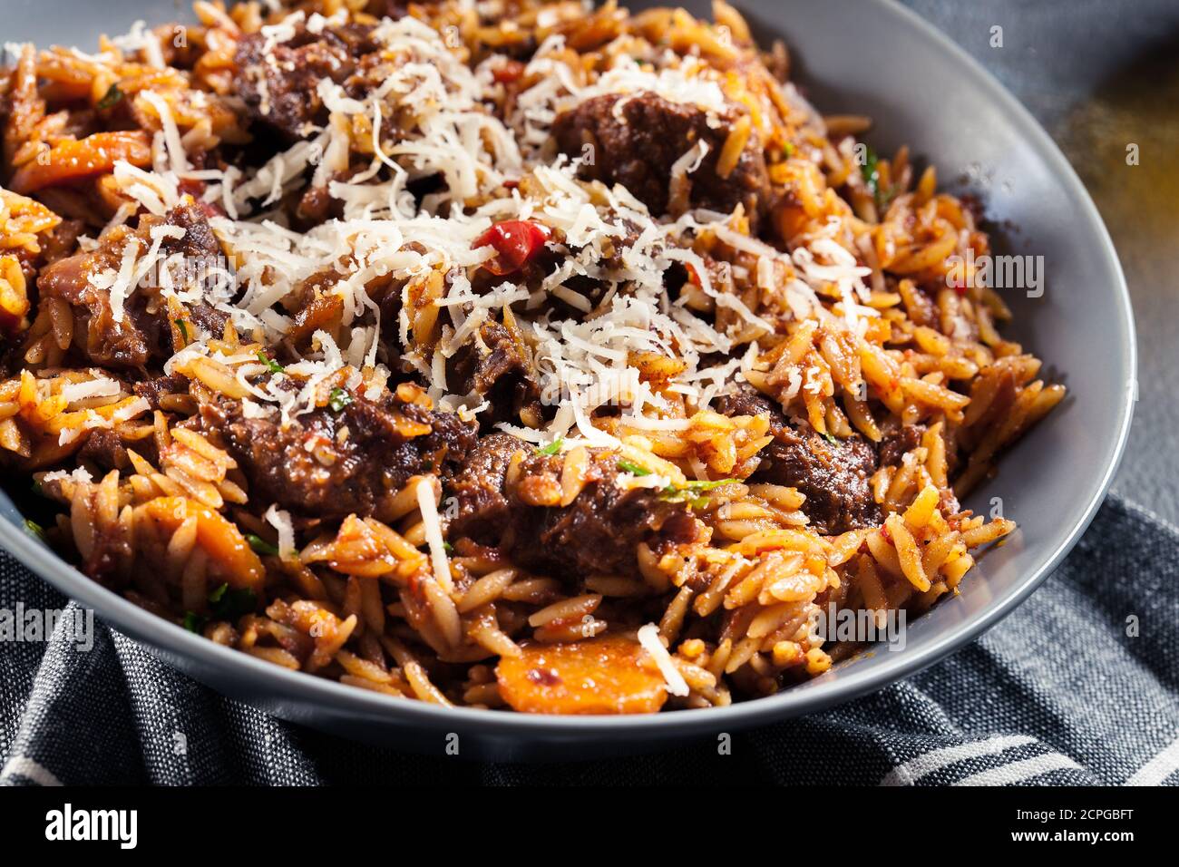 Giouvetsi - Greek beef and orzo stew. Balkanian cuisine Stock Photo - Alamy