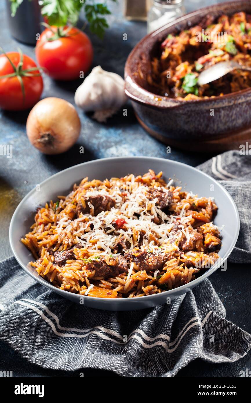 Giouvetsi - Greek beef and orzo stew. Balkanian cuisine Stock Photo - Alamy