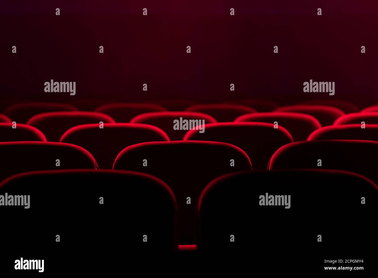 Empty cinema hall with red seats. Movie theatre Stock Photo - Alamy
