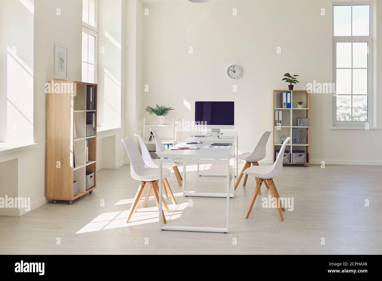Interior of office room with table, documents and desktop computer ...