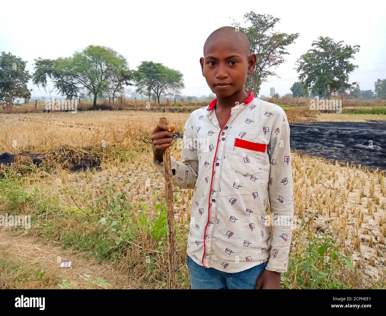 DISTRICT KATNI, INDIA - JANUARY 16, 2020: An indian village poor kid ...