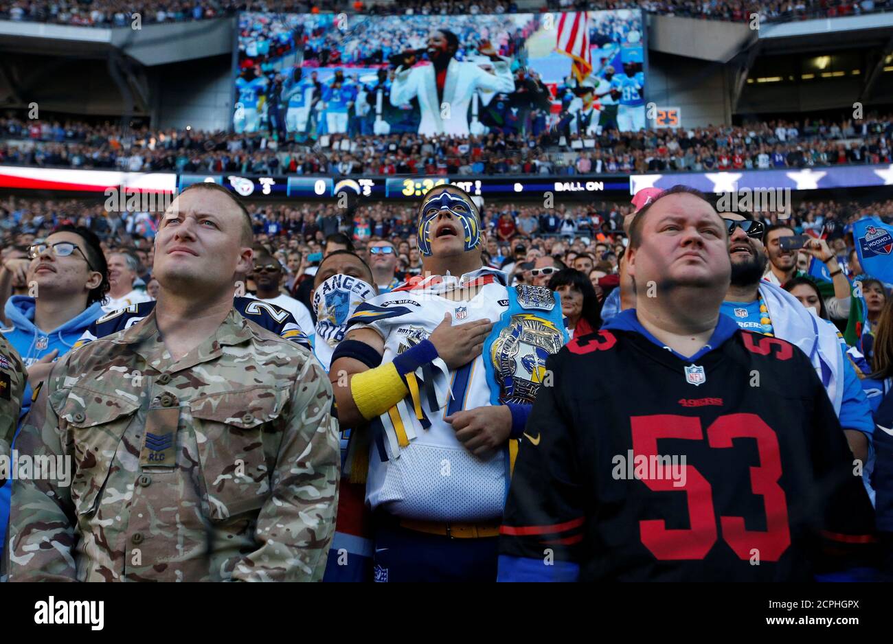 American fans during the national anthem hi-res stock photography and ...