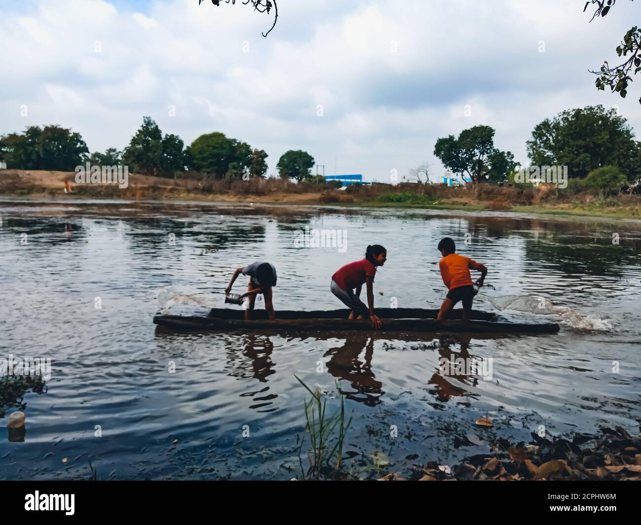 DISTRICT KATNI, INDIA - JANUARY 01, 2020: Asian village fisher kids ...