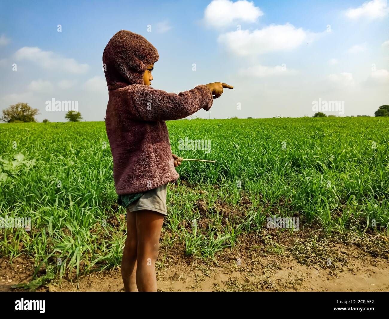 DISTRICT KATNI, INDIA - JANUARY 01, 2020: Asian poor village little boy ...