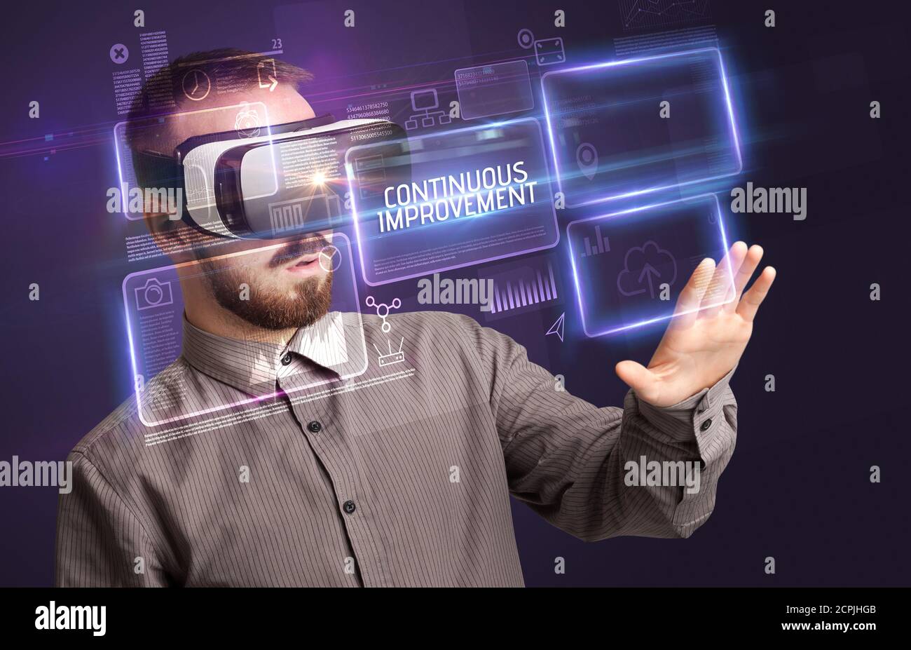 Businessman looking through Virtual Reality glasses with CONTINUOUS ...
