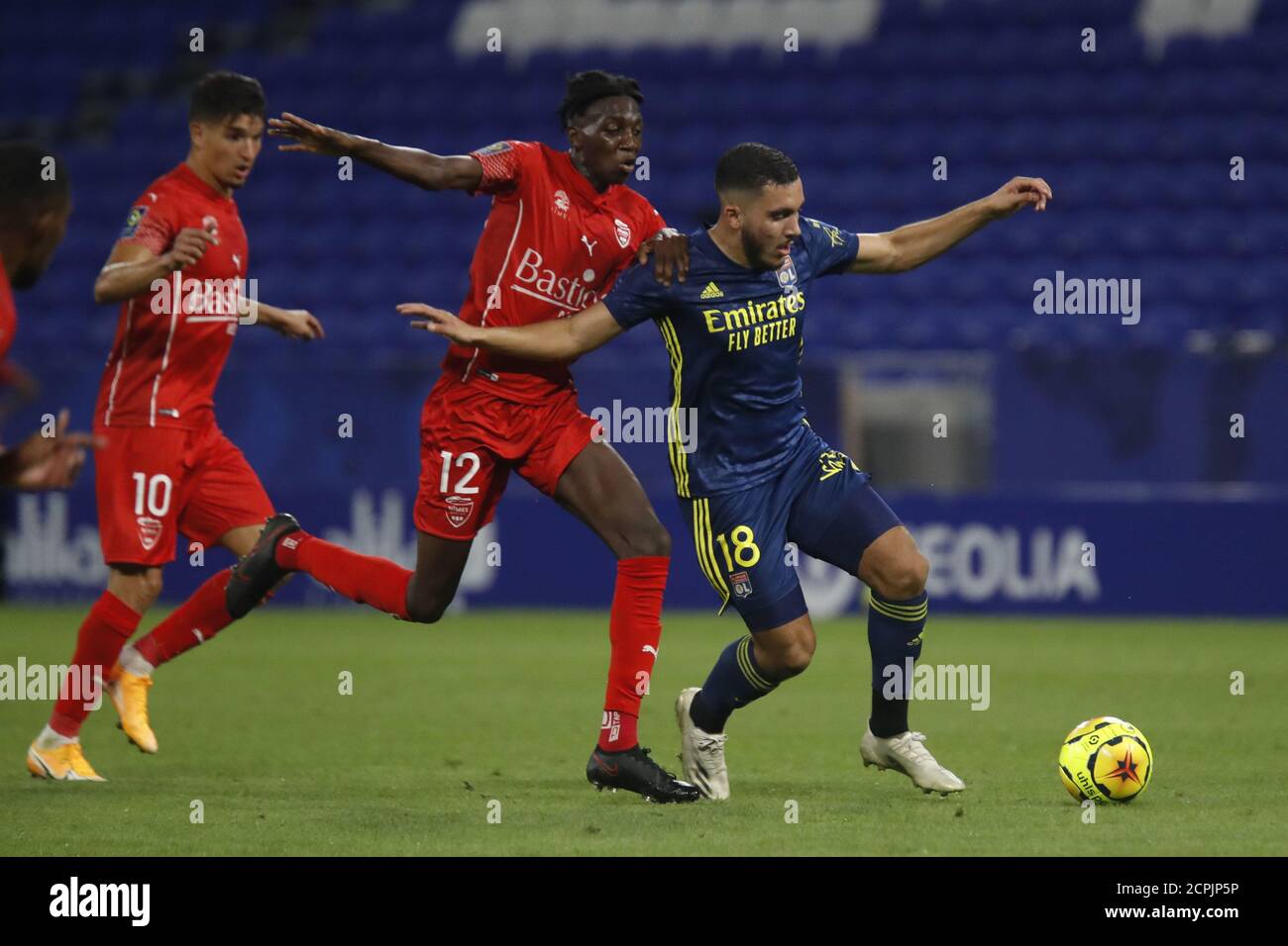Ryann CHERKI of Lyon and Lamine FOMBA of Nimes during the French ...