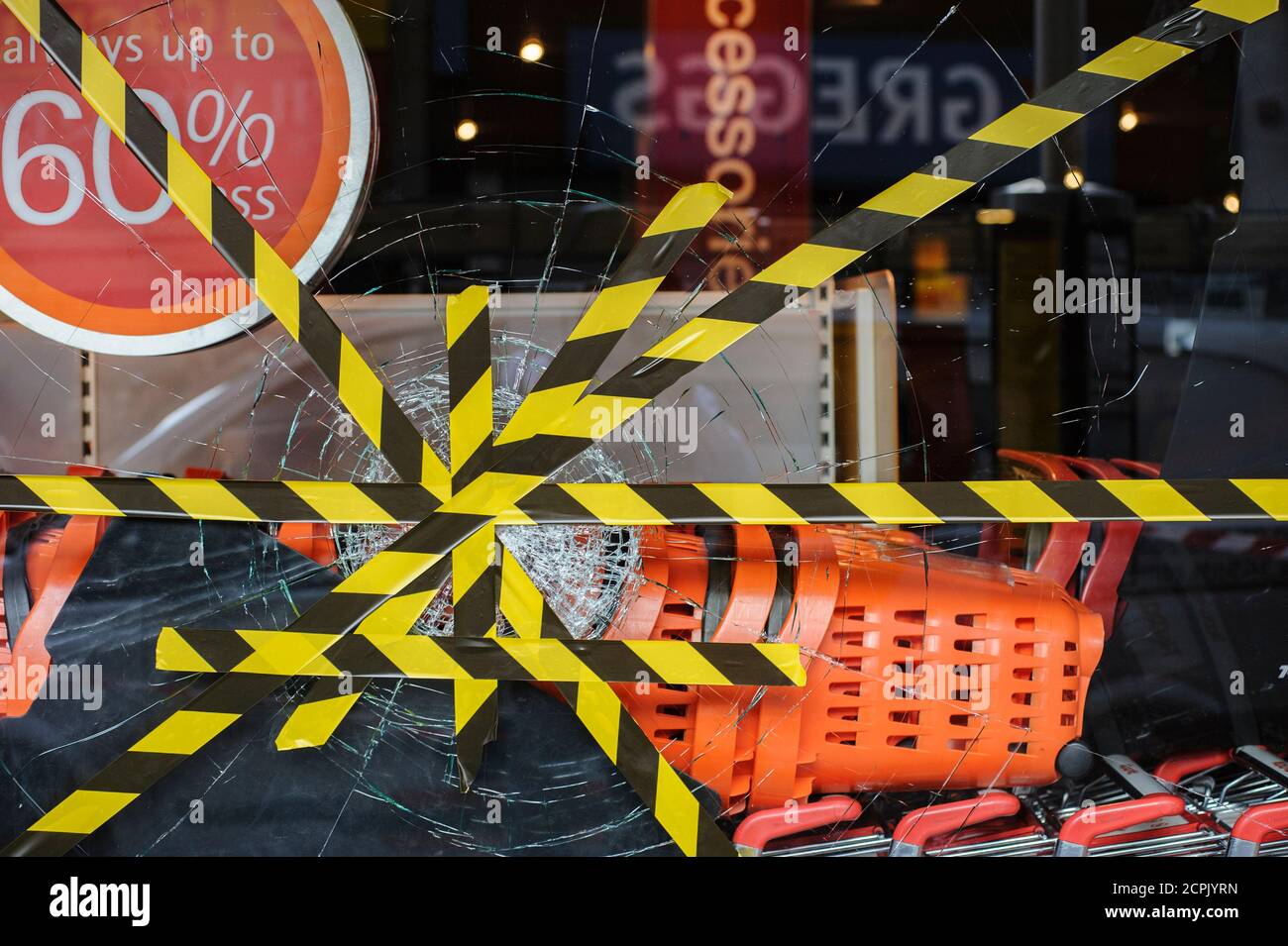 Smashed shop TK Maxx windows after London riots Stock Photo - Alamy