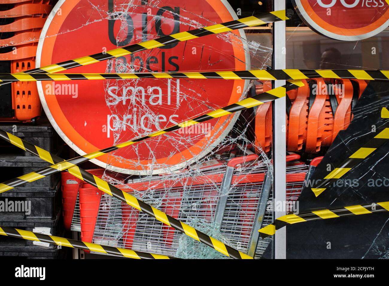 Smashed shop TK Maxx windows after London riots Stock Photo - Alamy