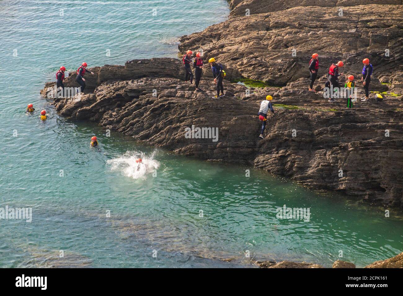 Coasteering on the North Devon coast near Croyde Stock Photo - Alamy
