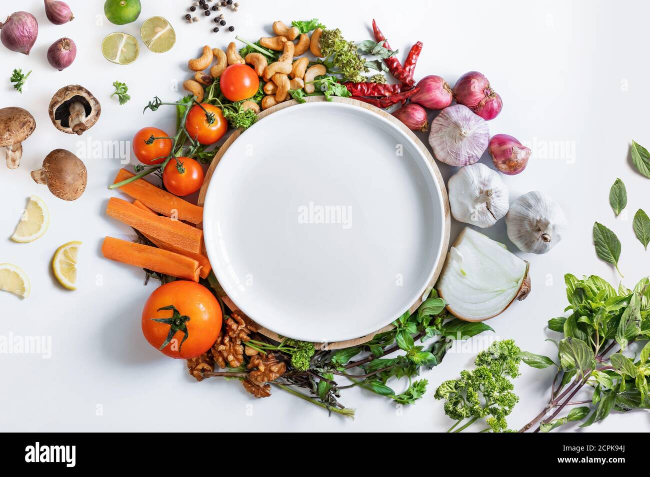 Healthy Eating. White ceramic dish surrounding with fresh healthy ...