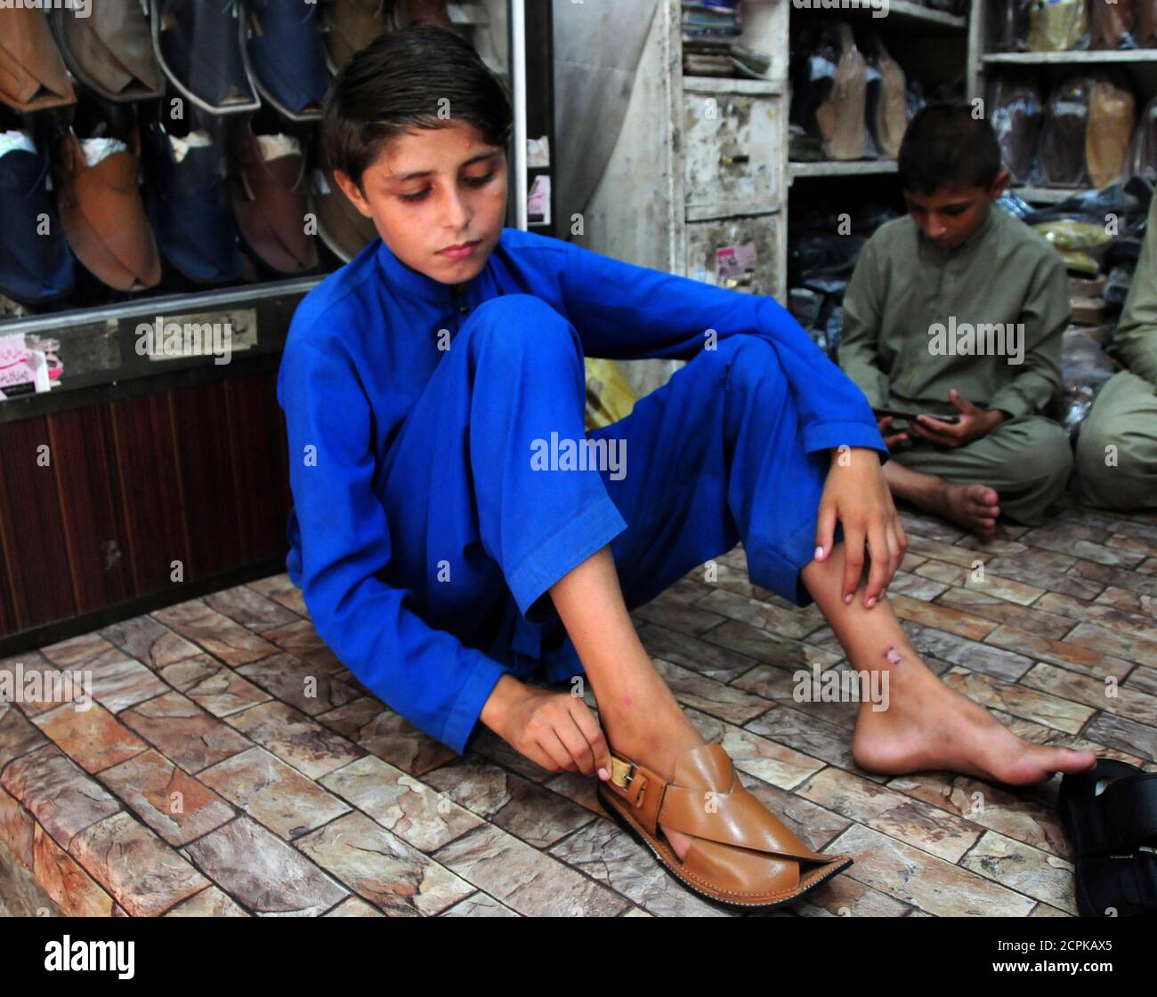 Boy wears hi-res stock photography and images - Alamy