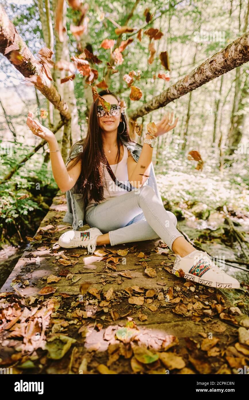 woman relax in autumn forest Stock Photo - Alamy