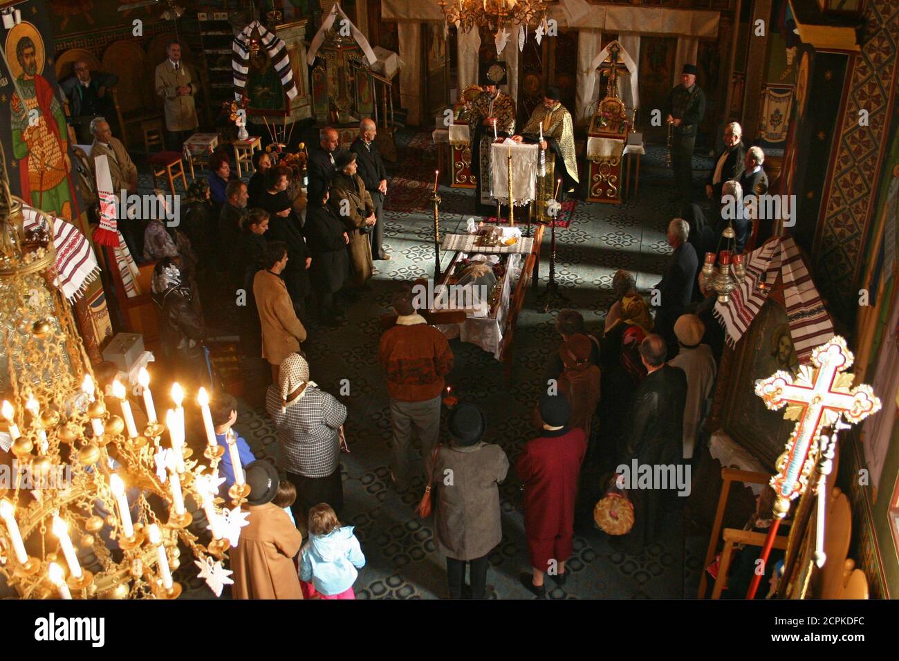 Funeral service inside an Orthodox church in Romania Stock Photo - Alamy