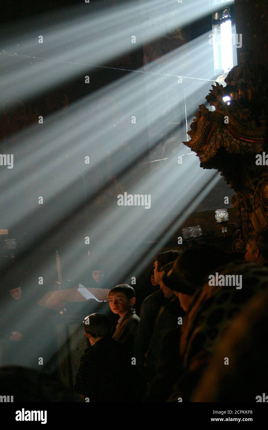 Sun rays filtered through a window inside a Christian Orthodox church ...