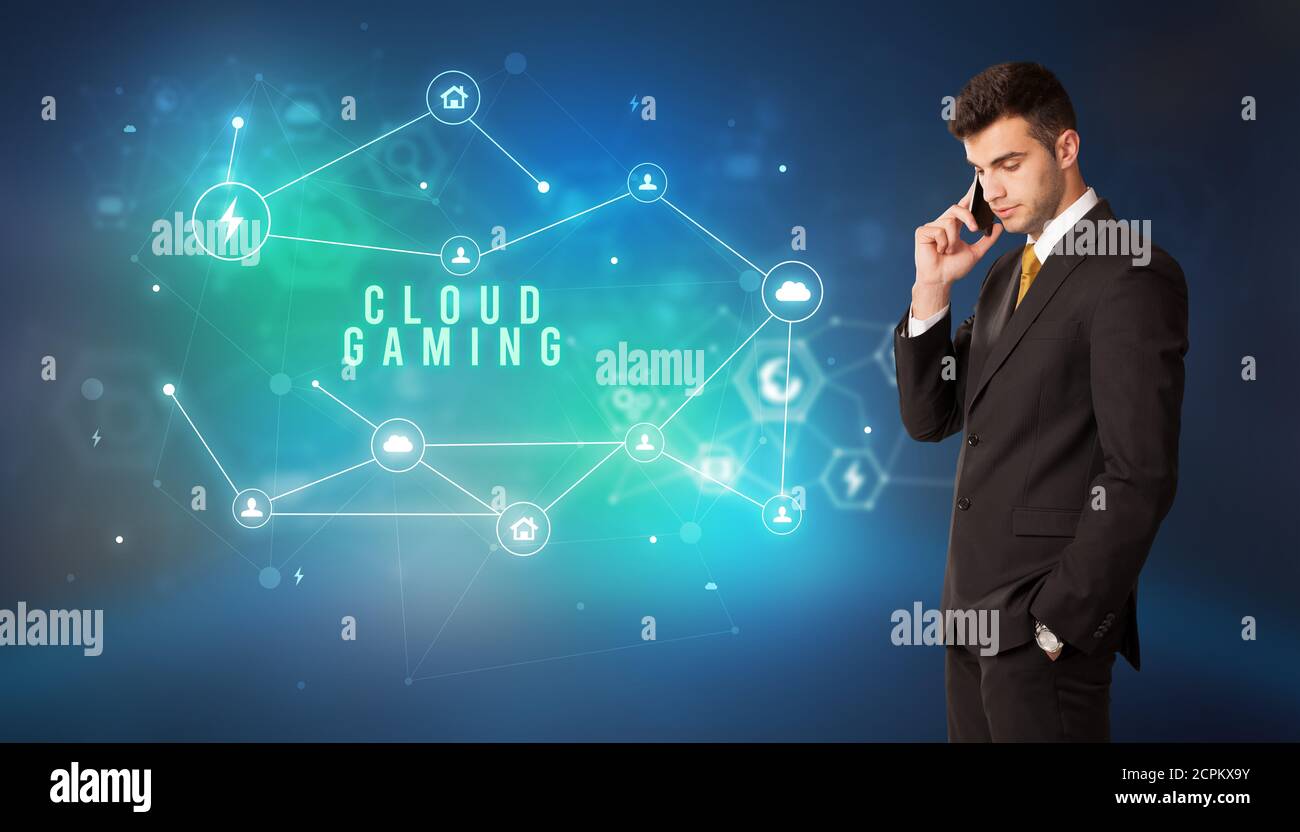 Businessman in front of cloud service icons with CLOUD GAMING ...