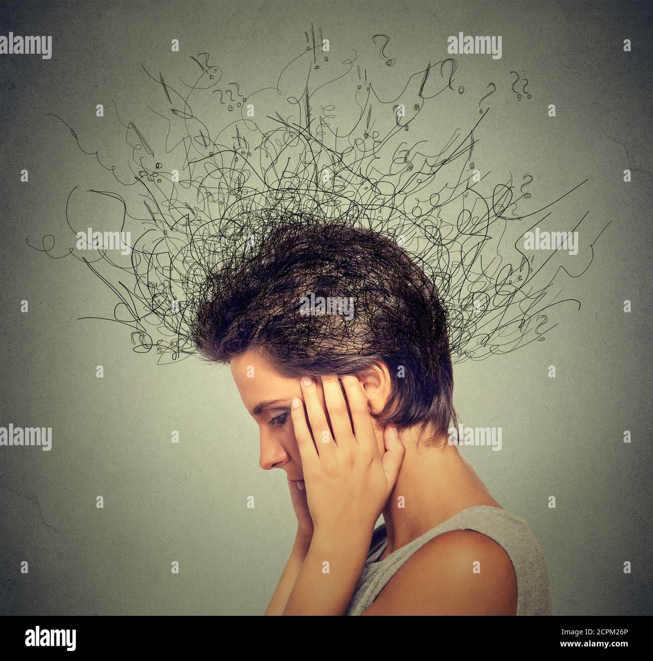 Closeup young woman with worried stressed face expression looking down ...