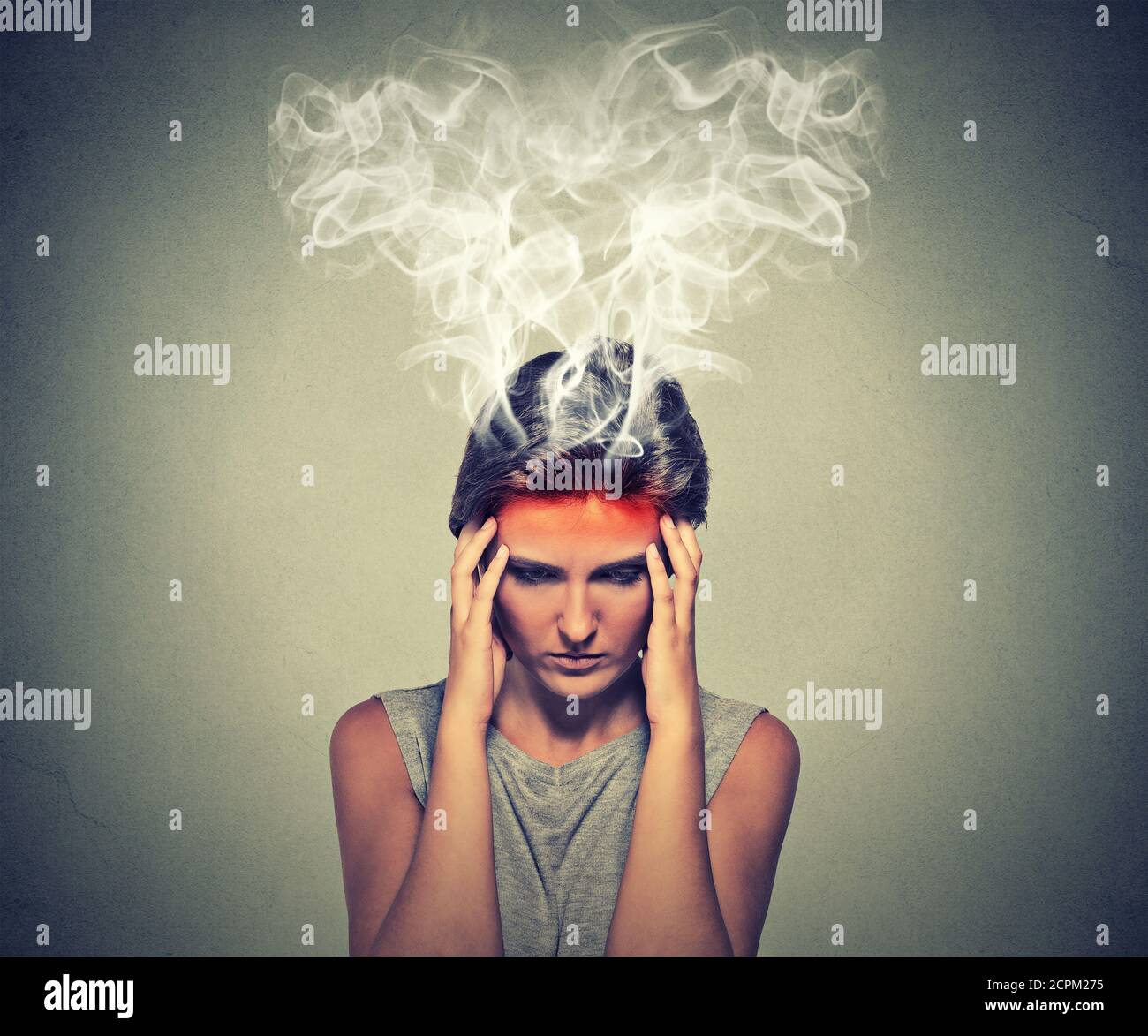 Portrait young stressed woman thinking too hard steam coming out up of ...