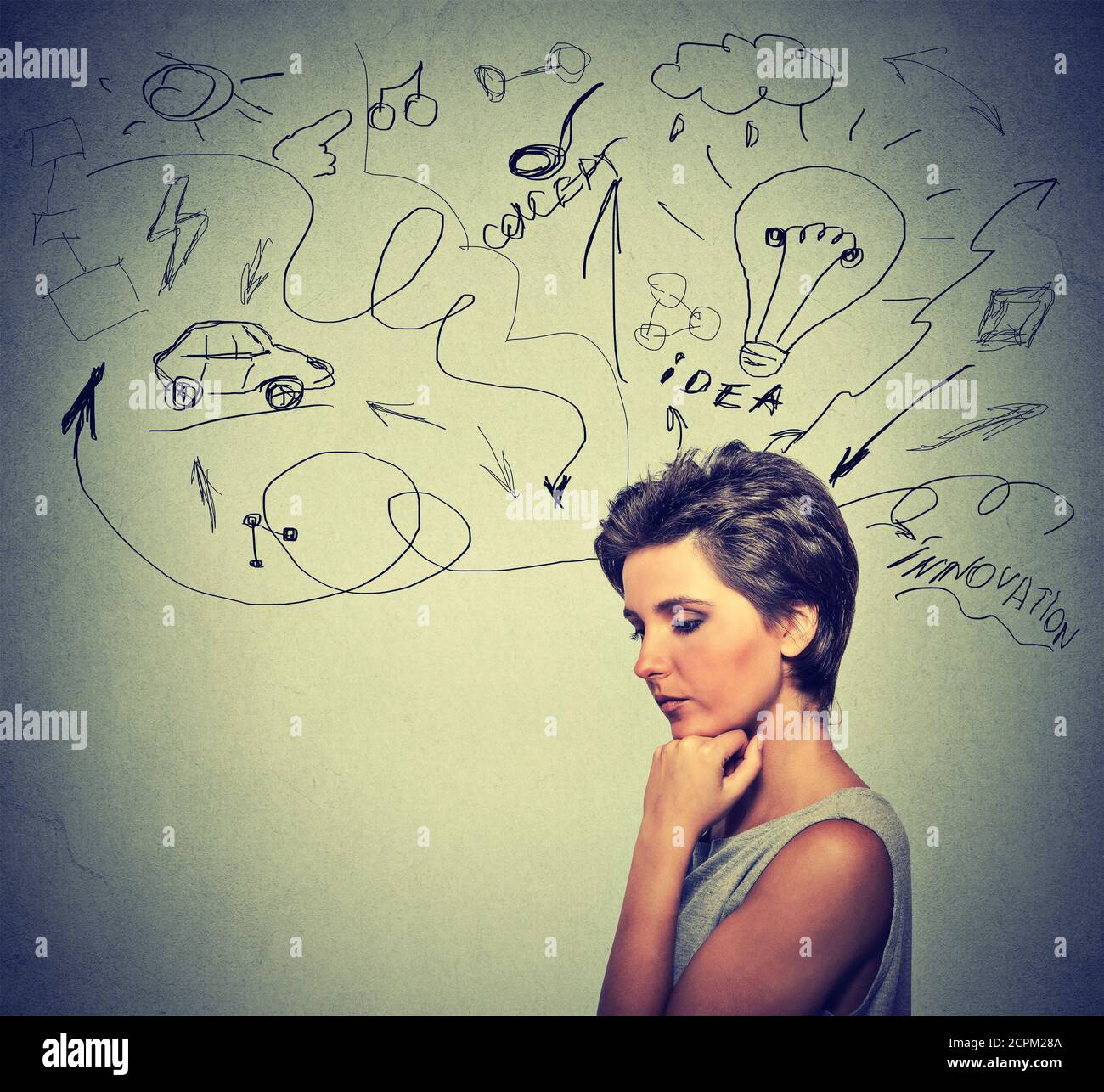 Portrait worried young woman thinking dreaming has many ideas looking ...