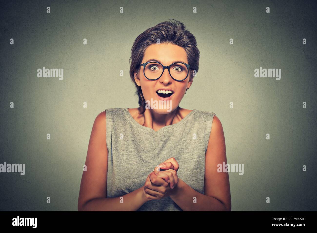 Closeup portrait of happy young woman looking excited surprised in full ...