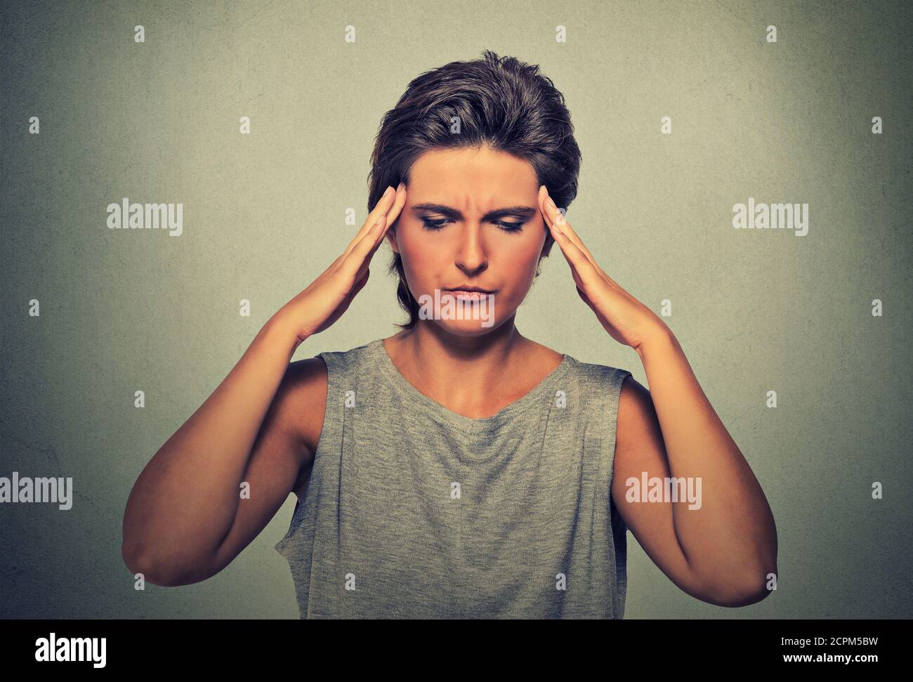 young woman trying to concentrate Stock Photo - Alamy