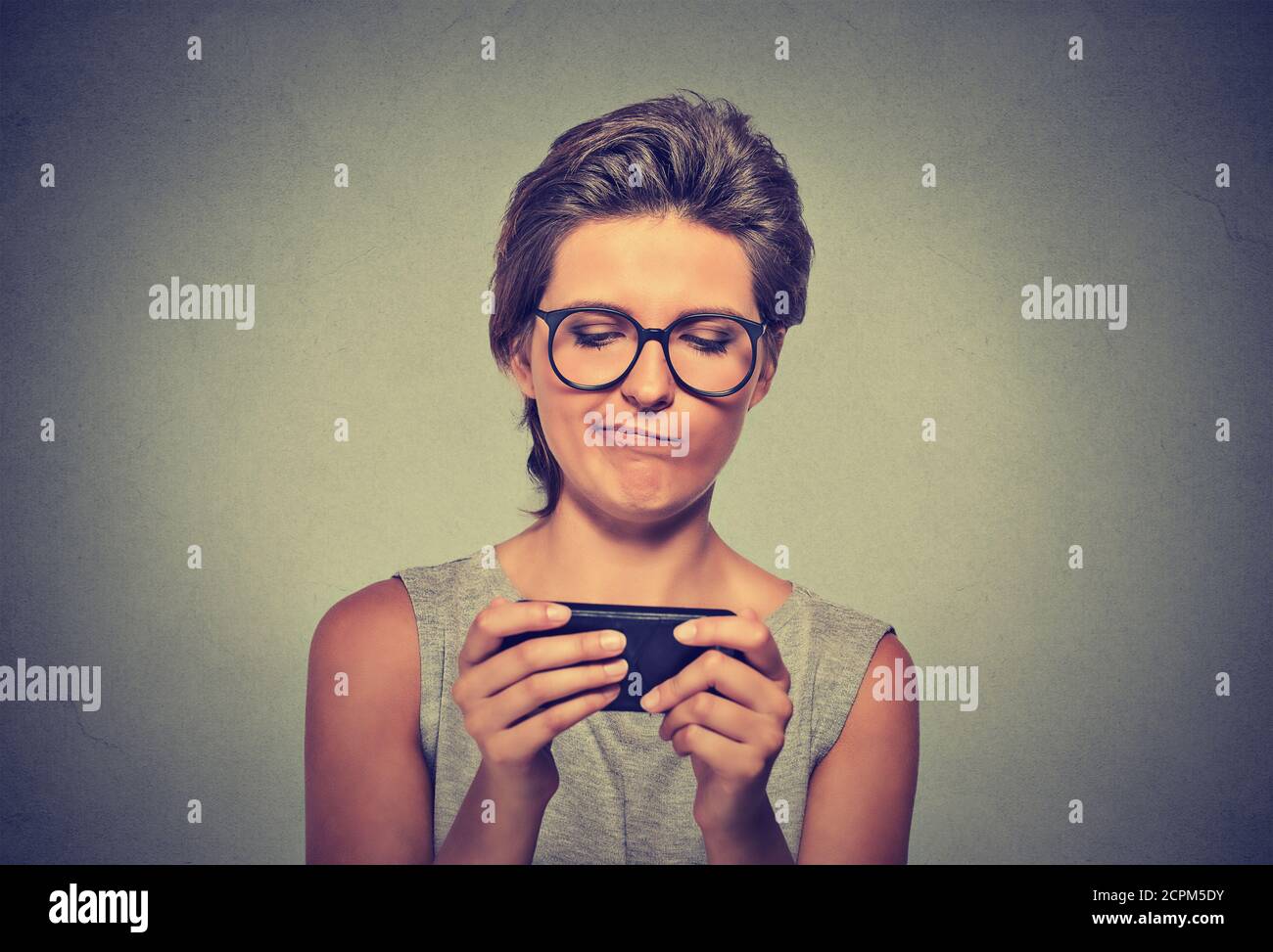 Woman reading text angry hi-res stock photography and images - Alamy