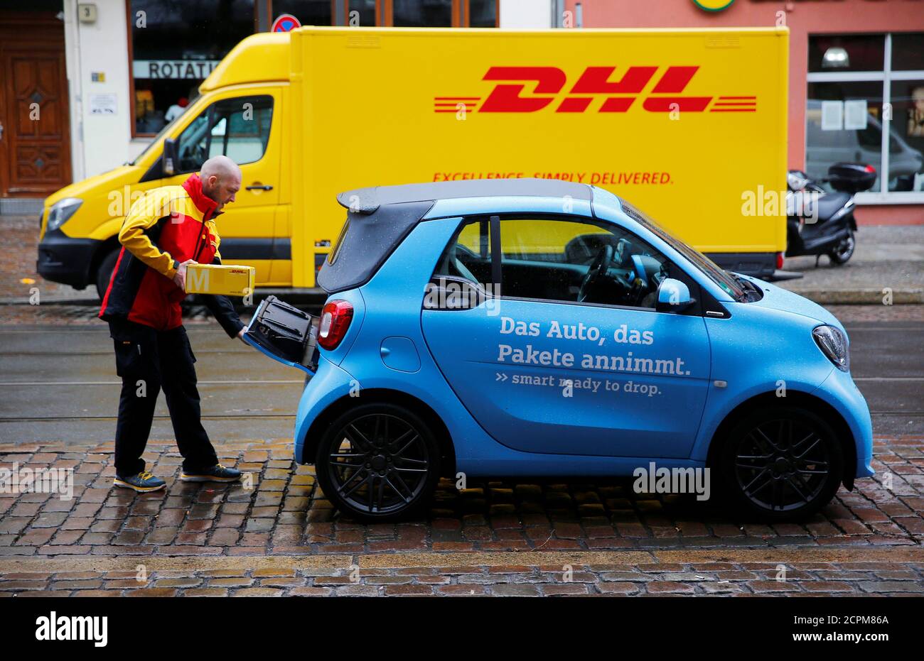 Dhl Employee High Resolution Stock Photography and Images - Alamy
