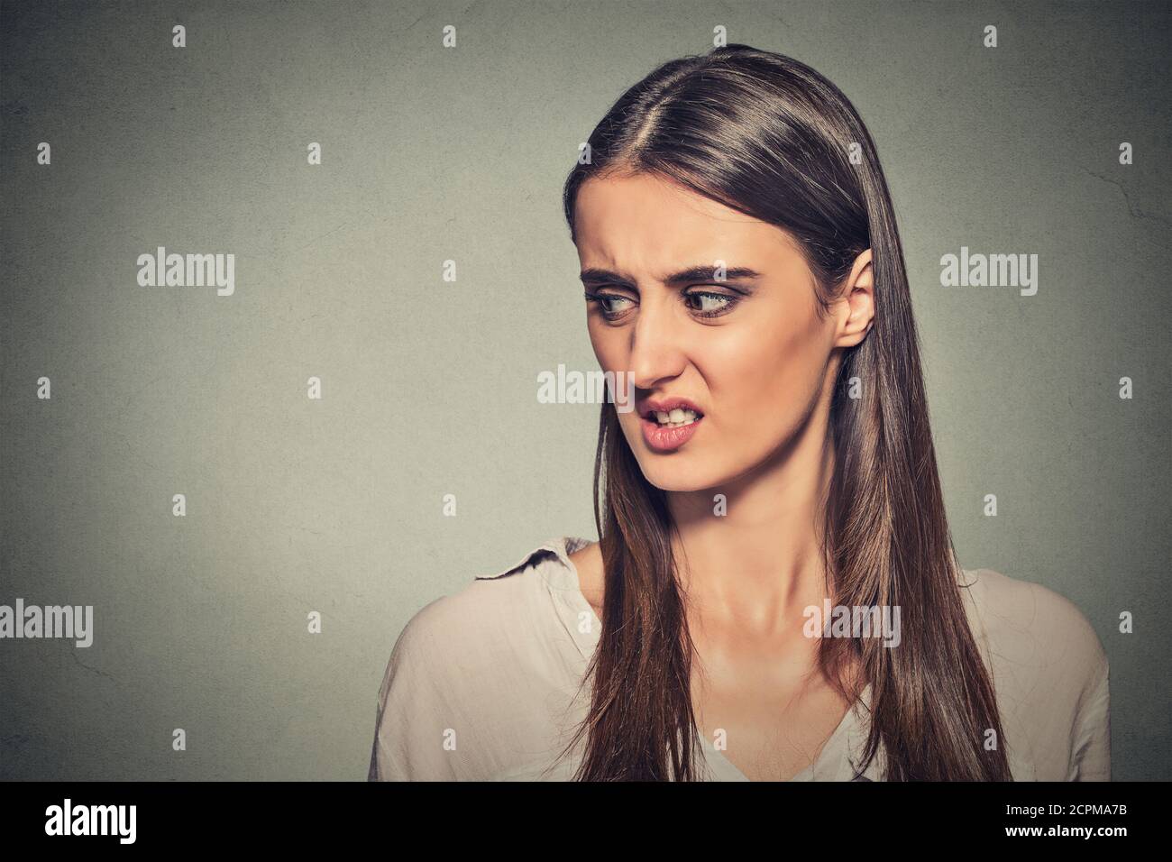 Young woman disgusted sad expression hi-res stock photography and ...