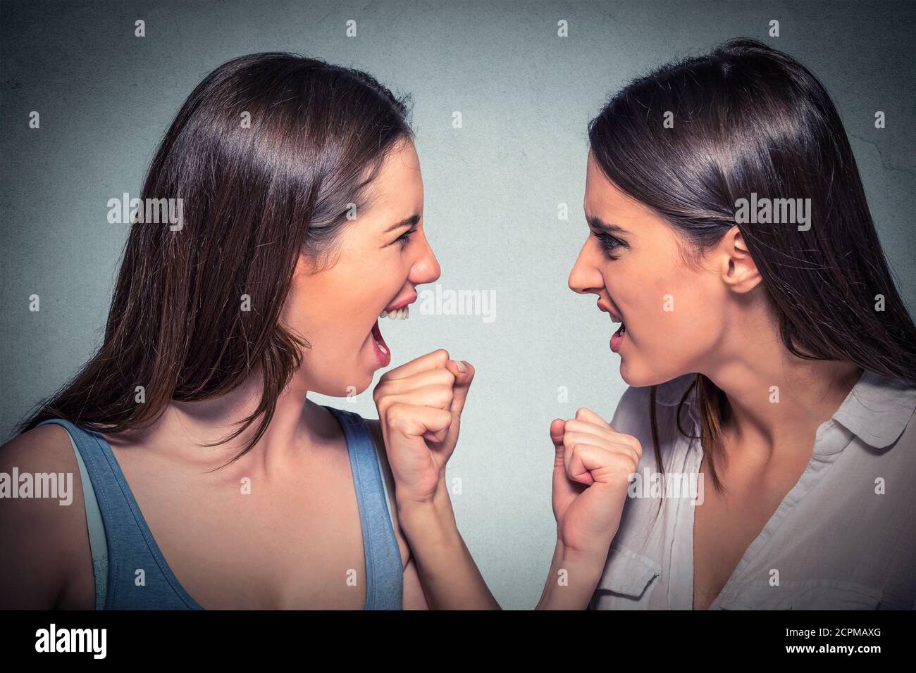 Two people screaming at each other hi-res stock photography and images ...