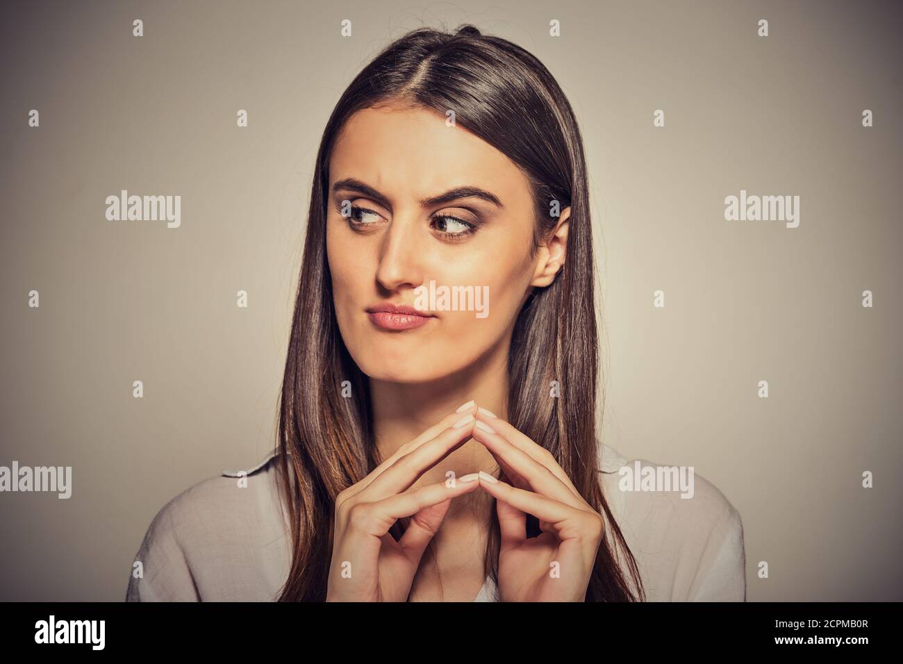 Closeup portrait of sneaky, sly, scheming young woman plotting ...