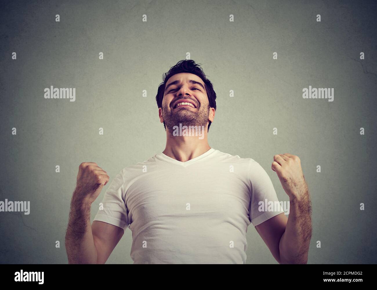 Closeup portrait happy successful man winning, fists pumped celebrating ...