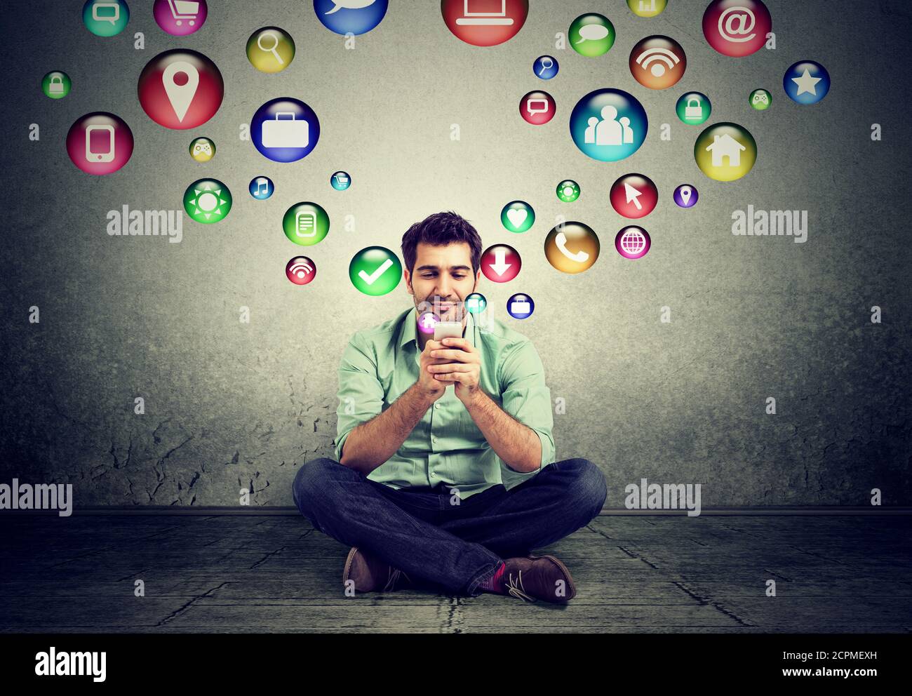 communication technology high tech concept. Happy man sitting on a ...