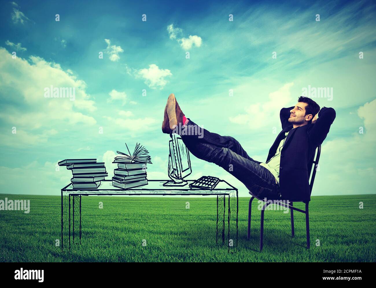 Happy business man relaxing at his desk outdoors in the middle of a ...